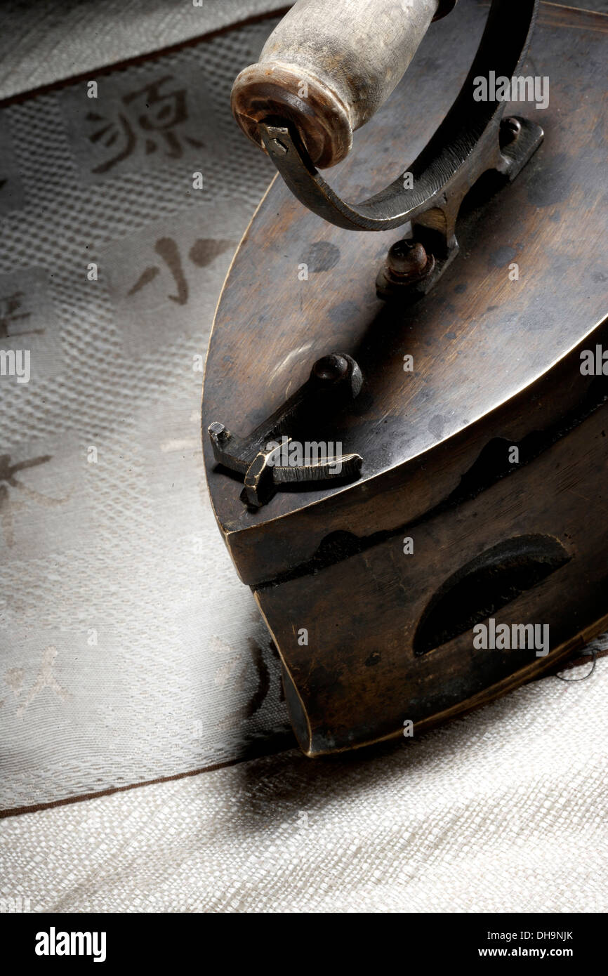 Antique clothes iron Stock Photo - Alamy