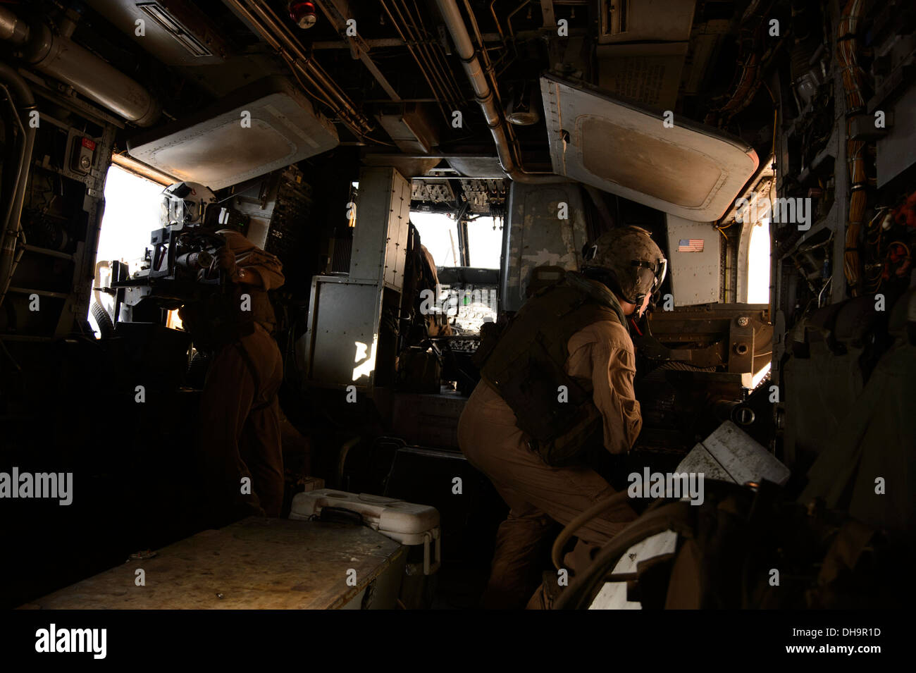 U.S. Marine helicopter crew chiefs with the Marine Medium Tiltrotor ...