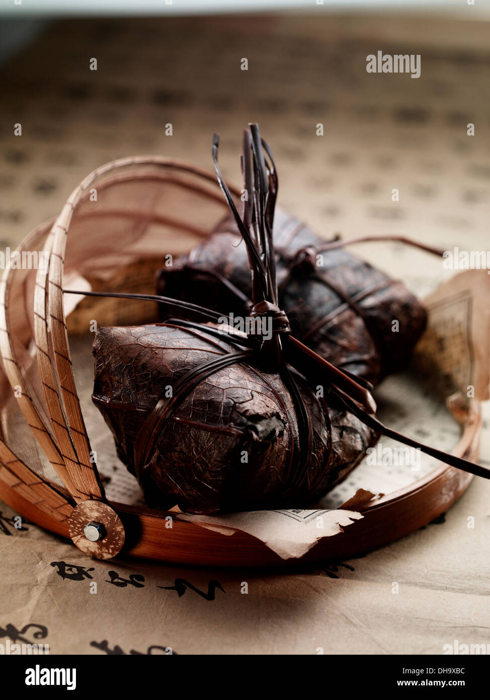 Chinese traditional food Zongzi in a bamboo container Stock Photo - Alamy