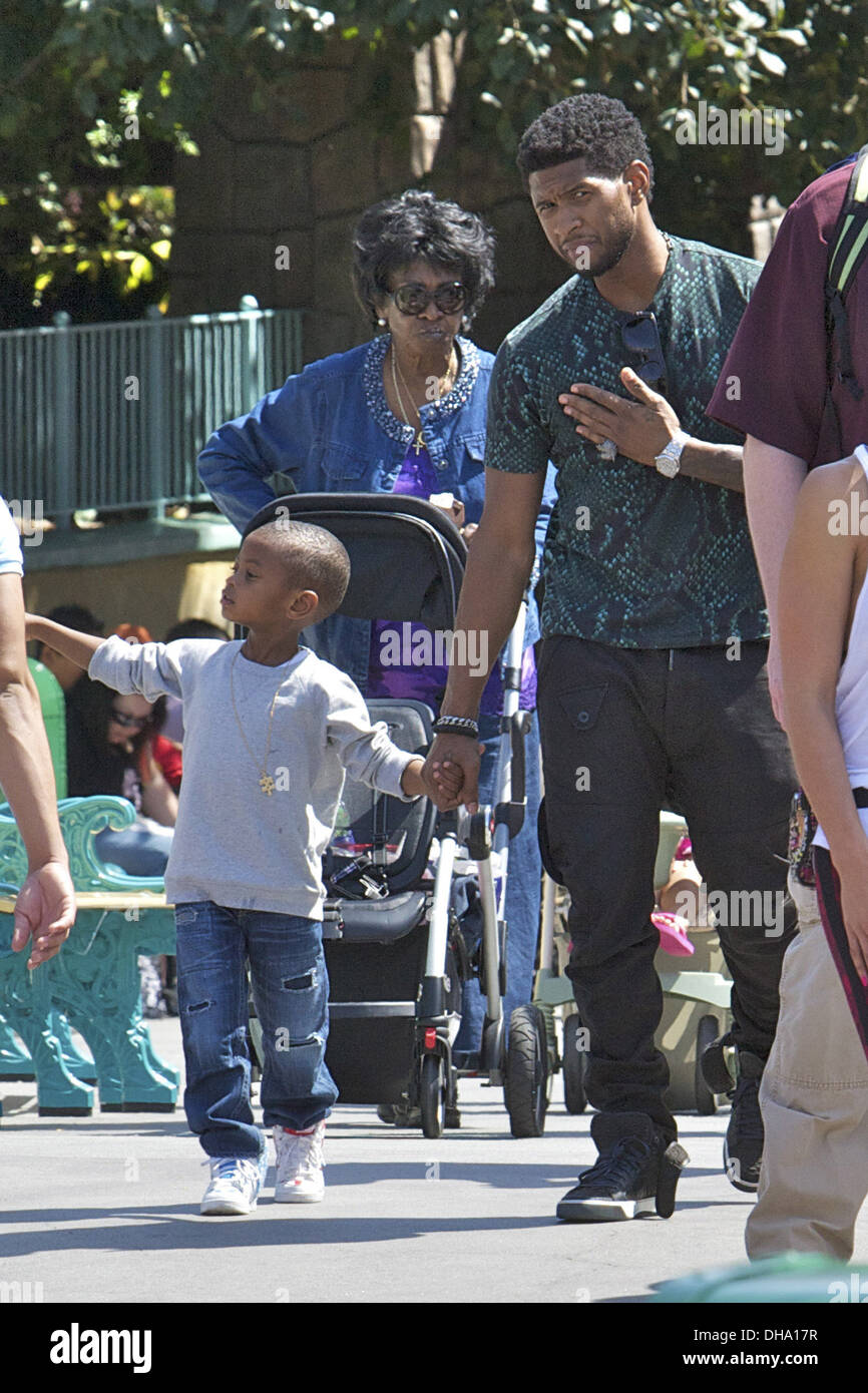 Usher enjoys day at Disneyland with his family Anaheim California - 06. ...