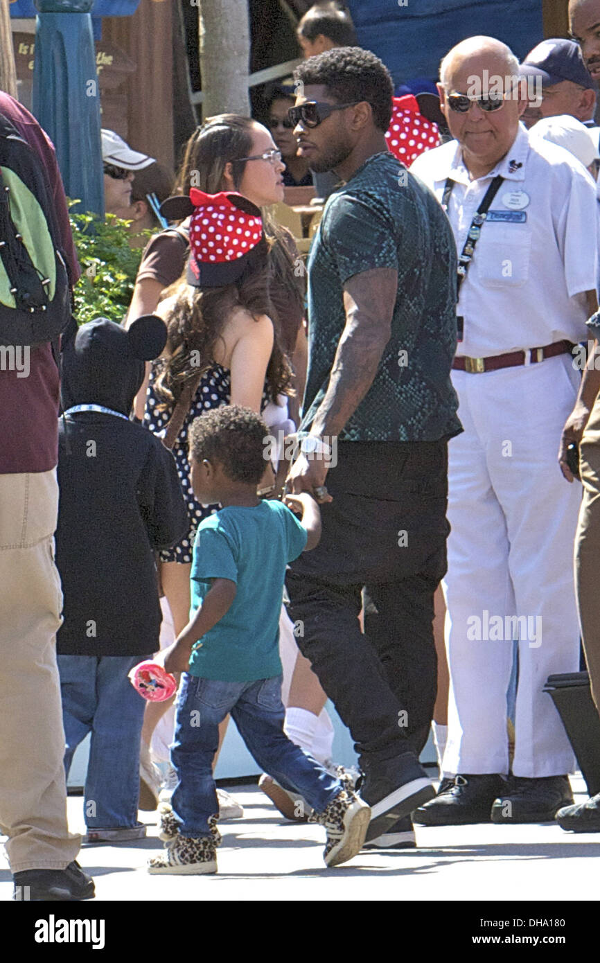 Usher enjoys day at Disneyland with his family Anaheim California - 06. ...
