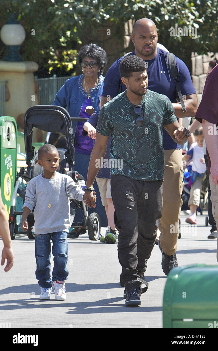 Usher enjoys day at Disneyland with his family Anaheim California - 06. ...