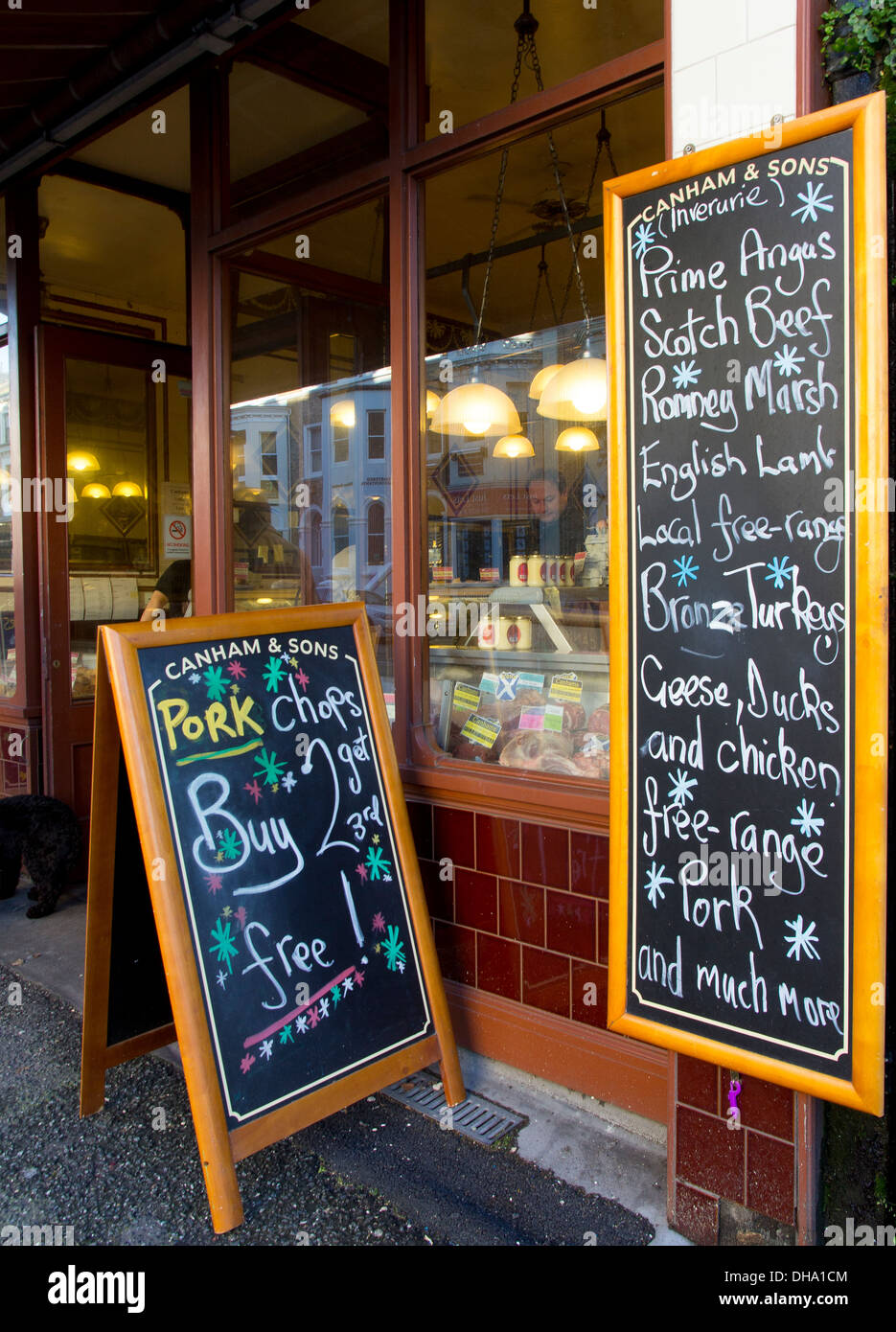 Blackboards outside Canham & Sons, a traditional butcher shop on Church ...