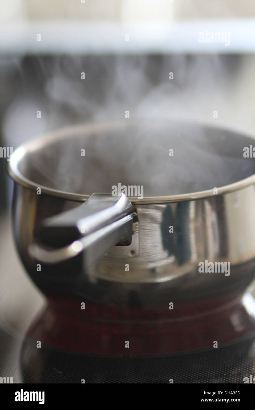 A pot of boiling water Stock Photo - Alamy