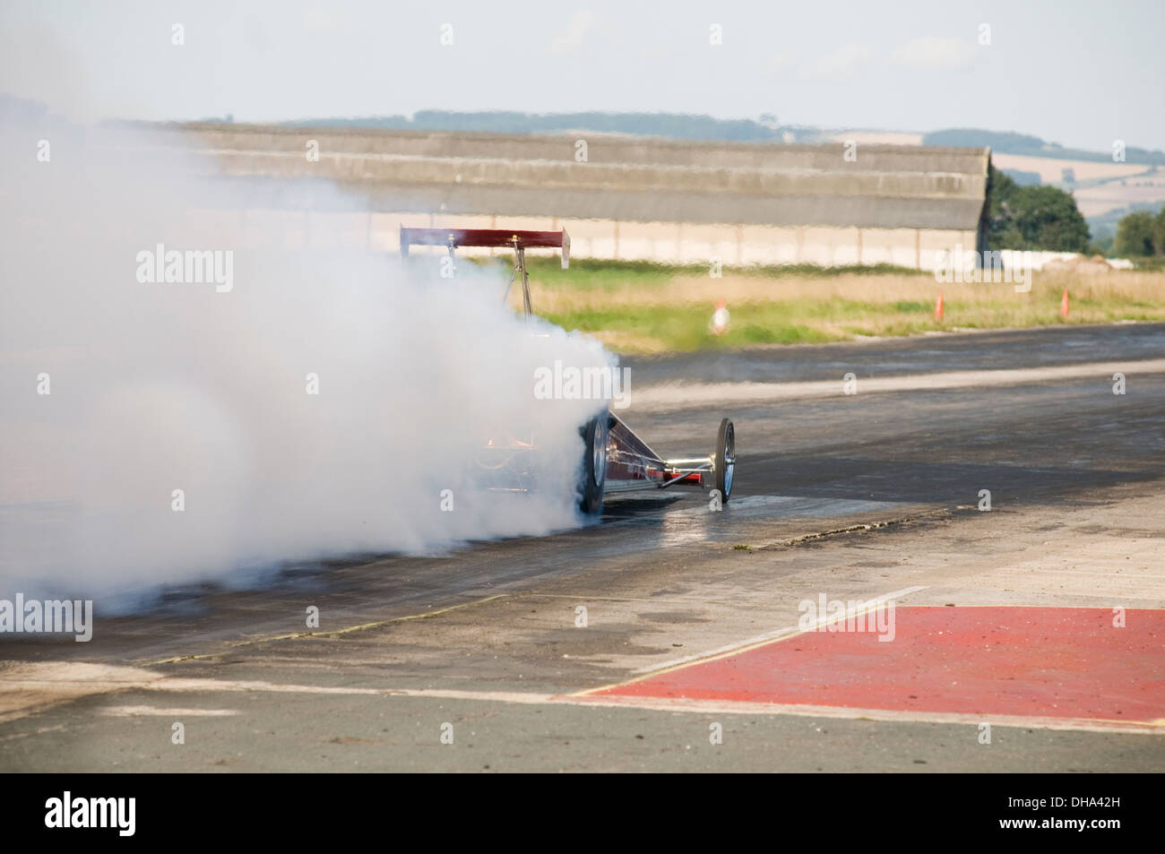 dragster dragsters burnout burning out smoke the tires spinning its ...