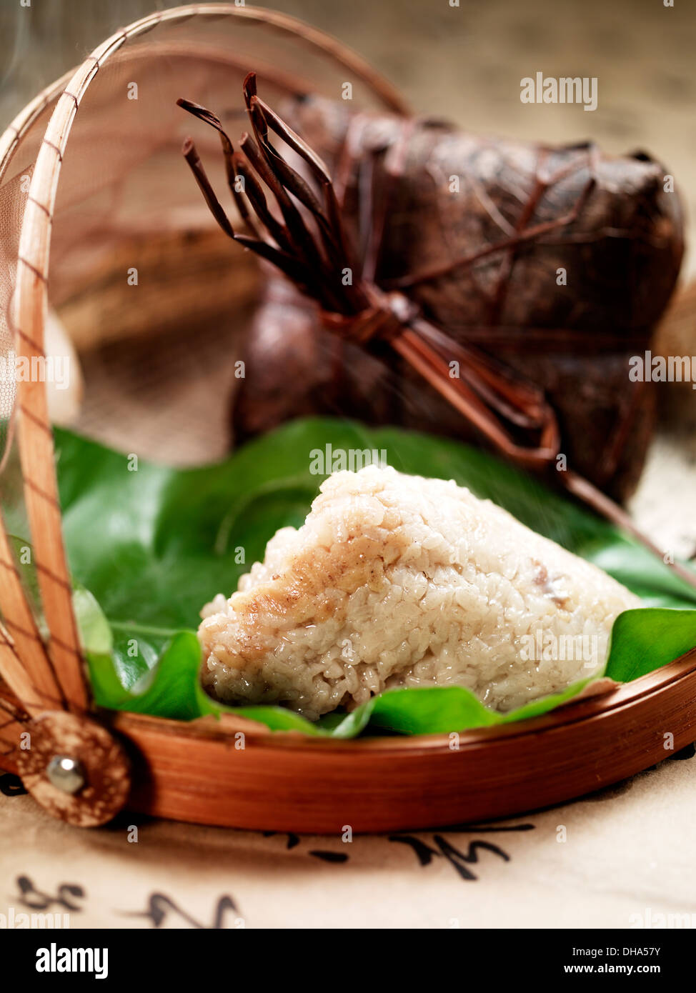 Chinese traditional food Zongzi in a bamboo container Stock Photo - Alamy