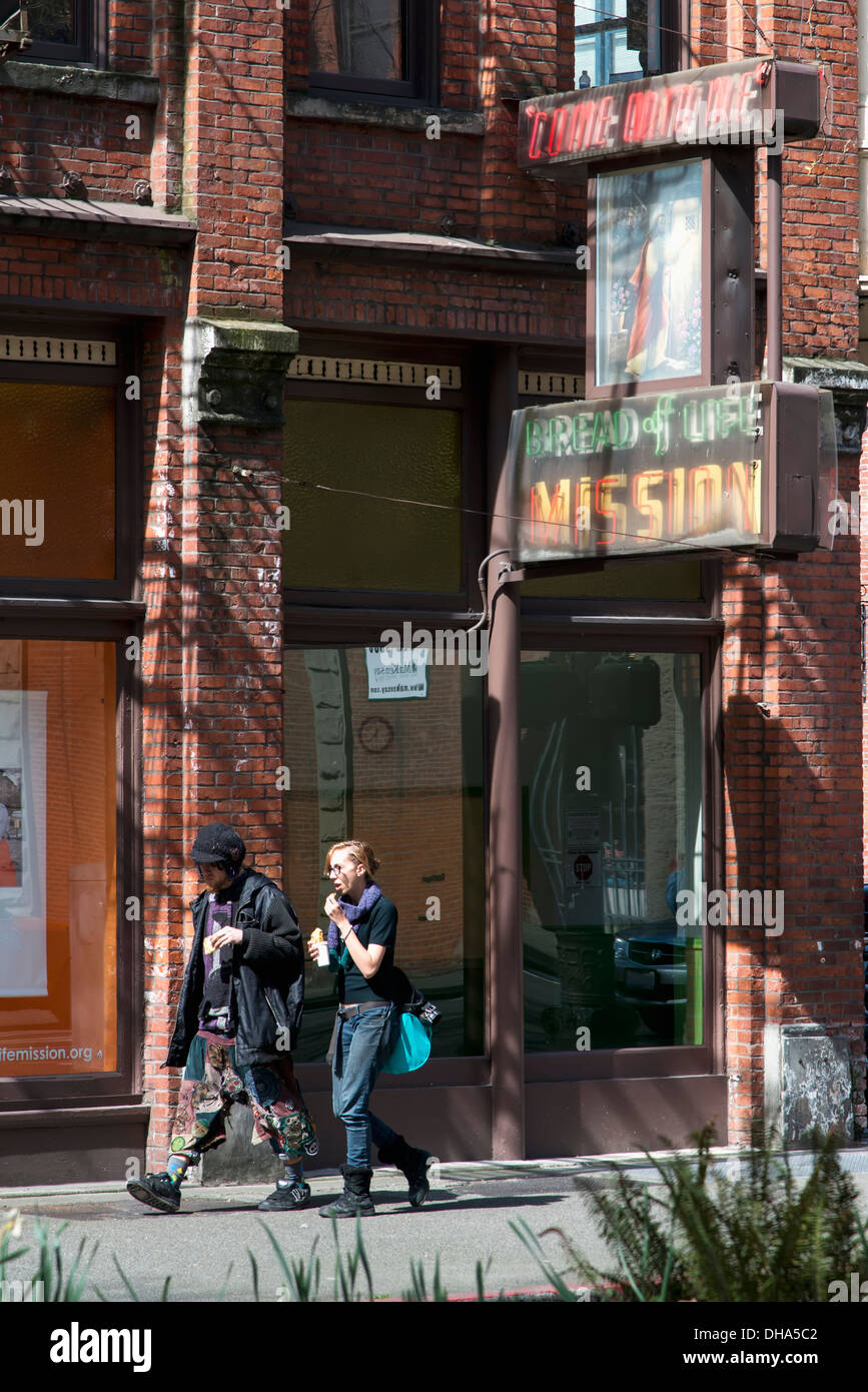 Two Homeless People Walk From The Bread Of Life Mission; Seattle ...