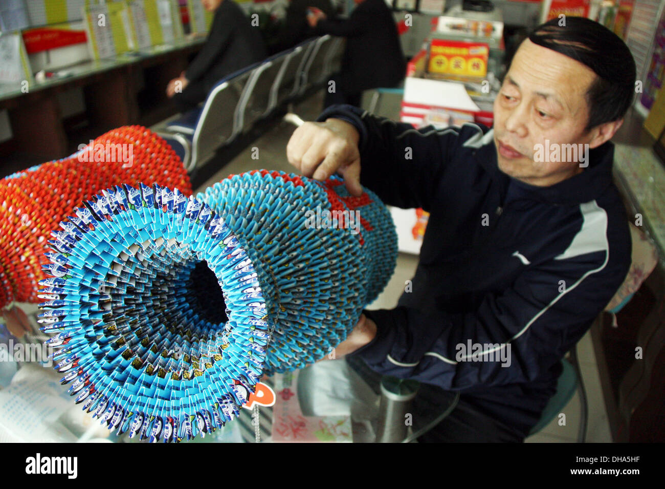 Lottery Ticket Sculptures Lottery store owner Qi Jinhua has made these ...
