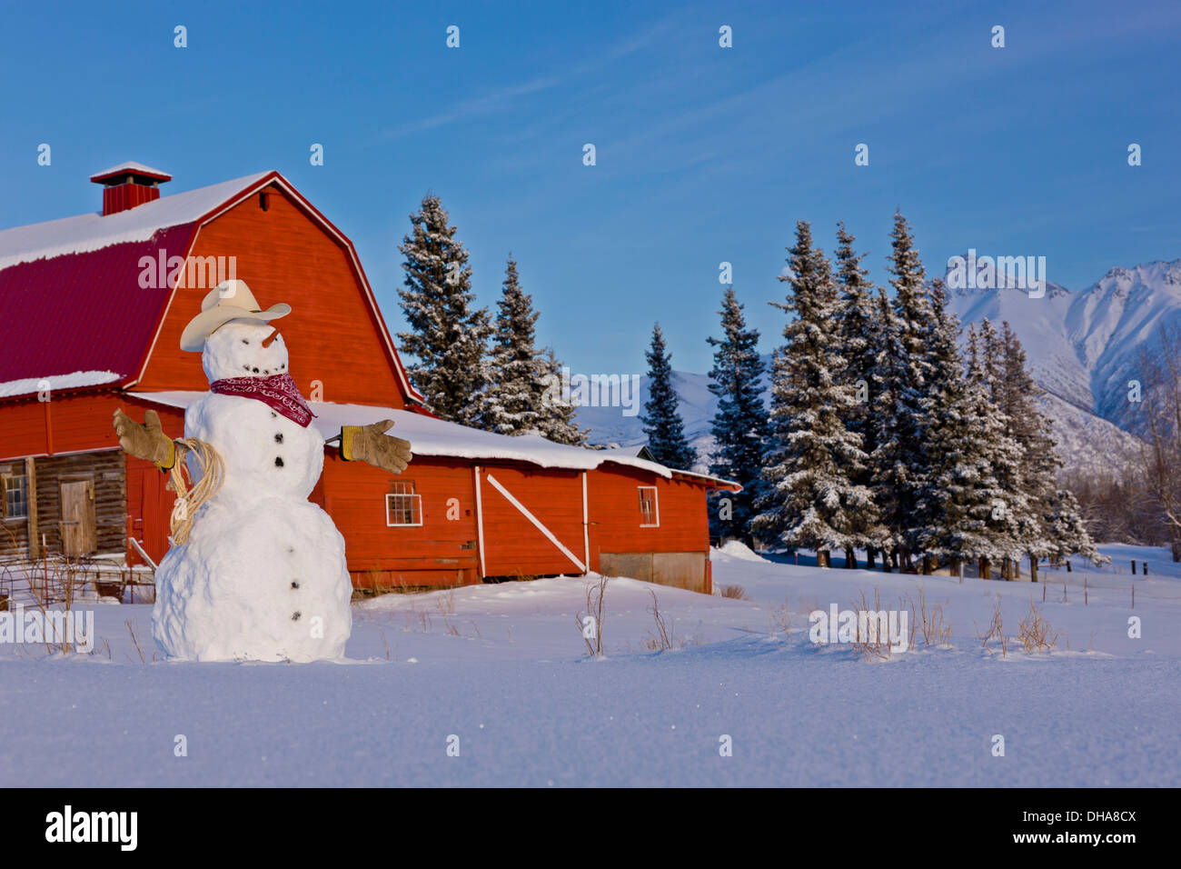 Snowman in front of red barn hi-res stock photography and images - Alamy