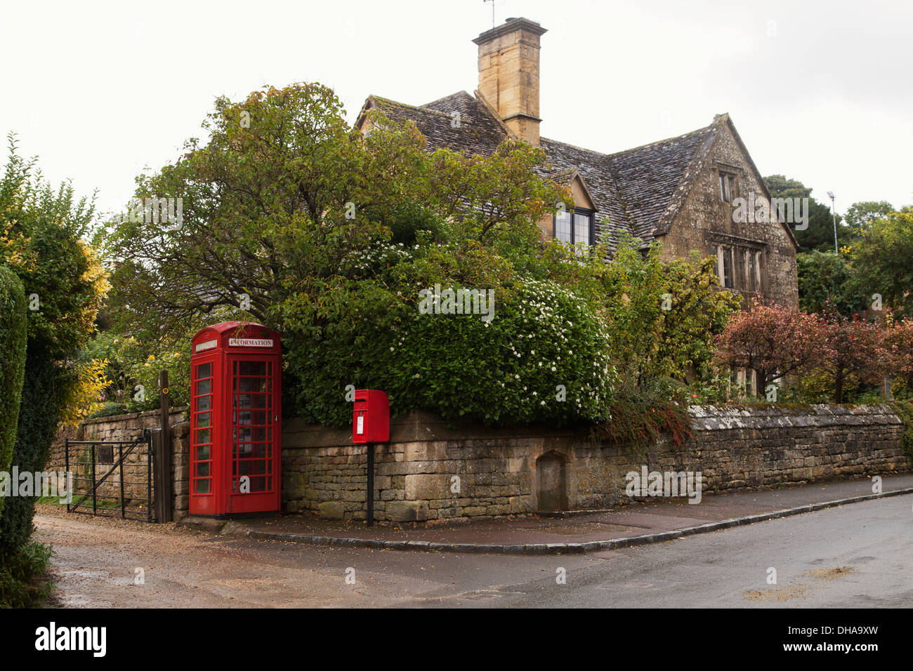 A Red Telephone Booth And Post Box Along A Street; England Stock Photo ...