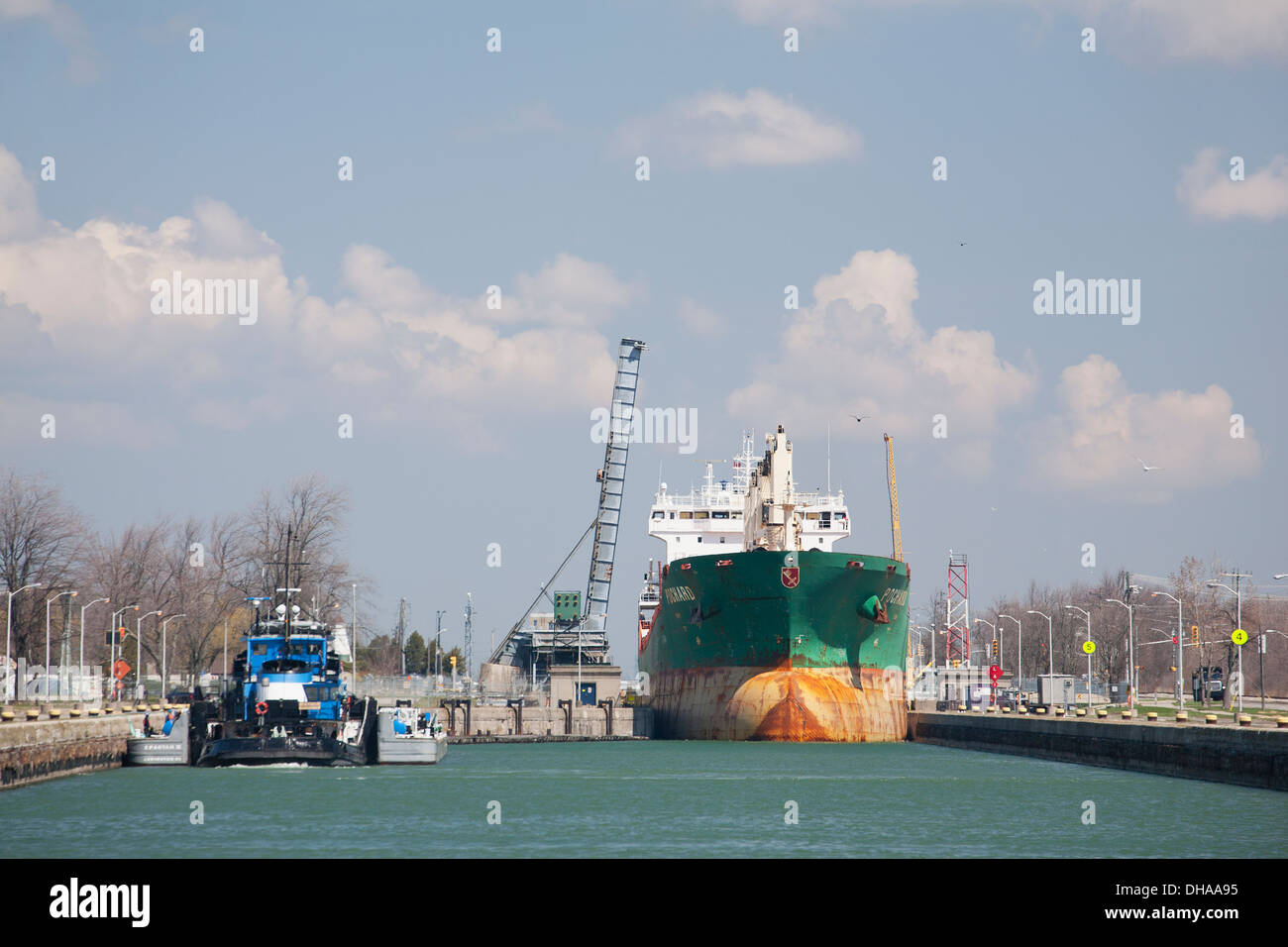 Large Ship In Welland Canal, Bridge Raised With Clouds And Blue Sky ...