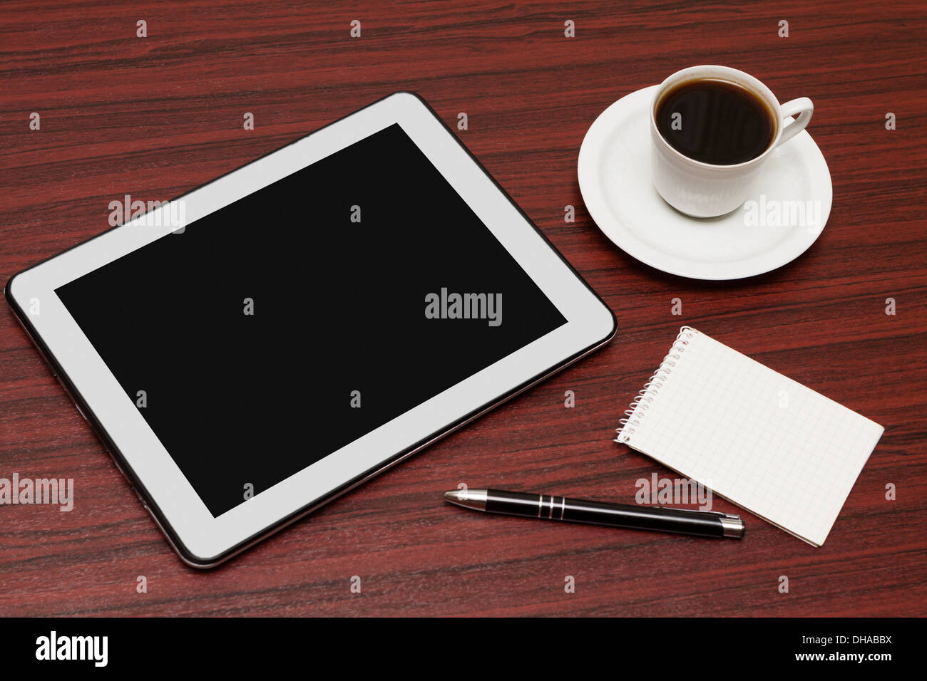 empty tablet and a cup of coffee on the desk Stock Photo - Alamy