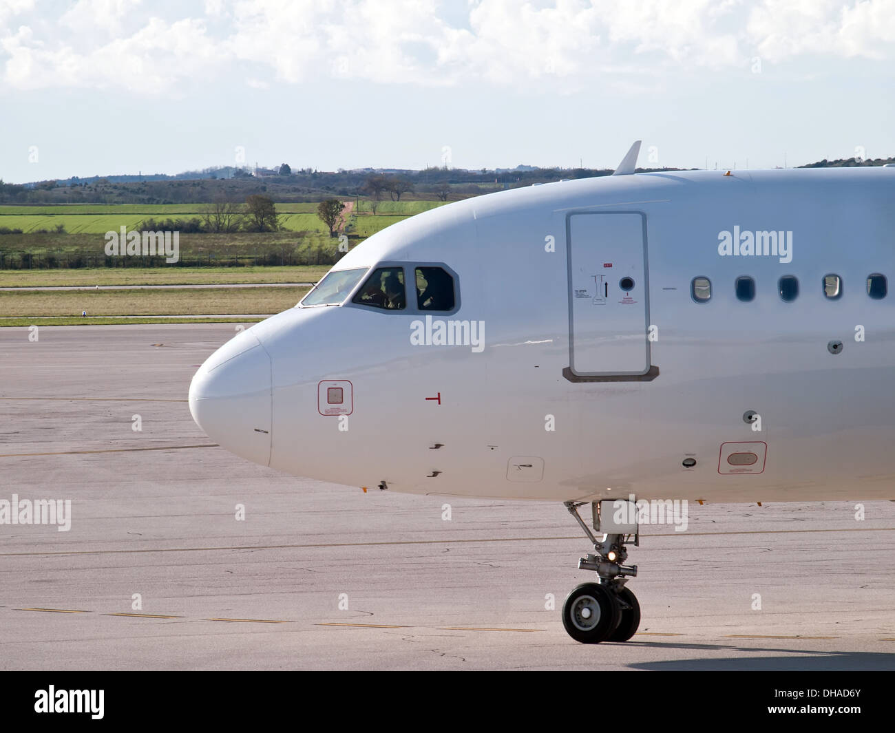 passenger aircraft on airport preparing for takeoff Stock Photo - Alamy