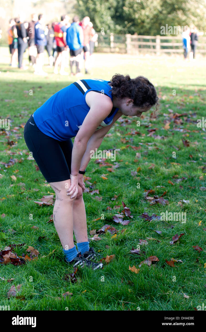 Exhausted female runner hi-res stock photography and images - Alamy