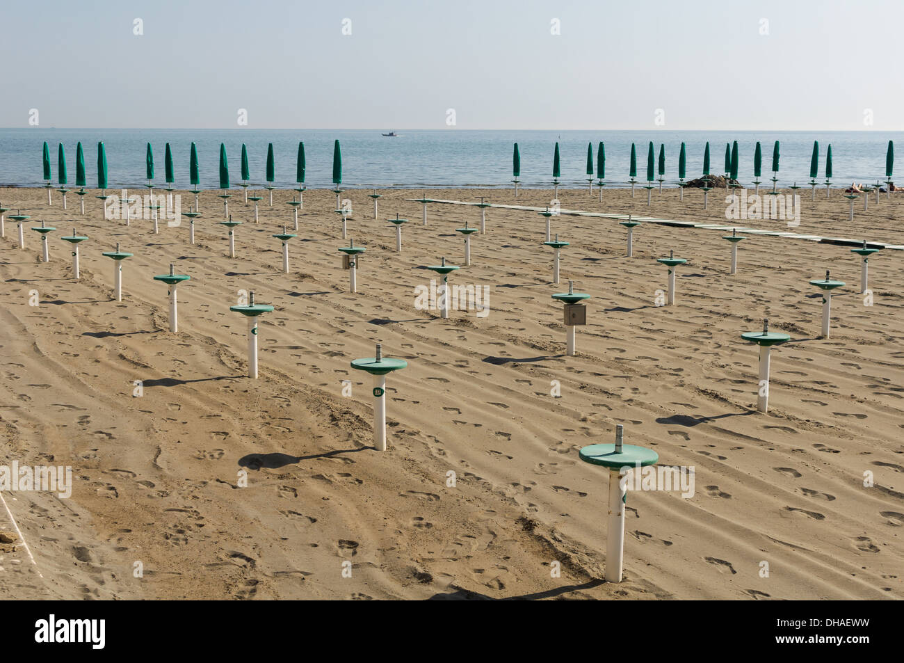 Green parasol on the beach Stock Photo - Alamy