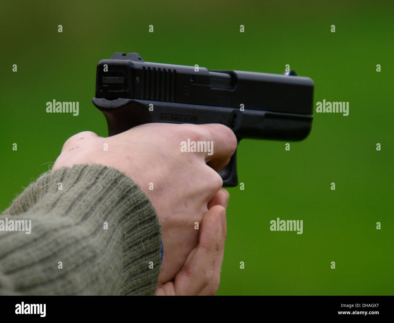 Hands with pistol hi-res stock photography and images - Alamy