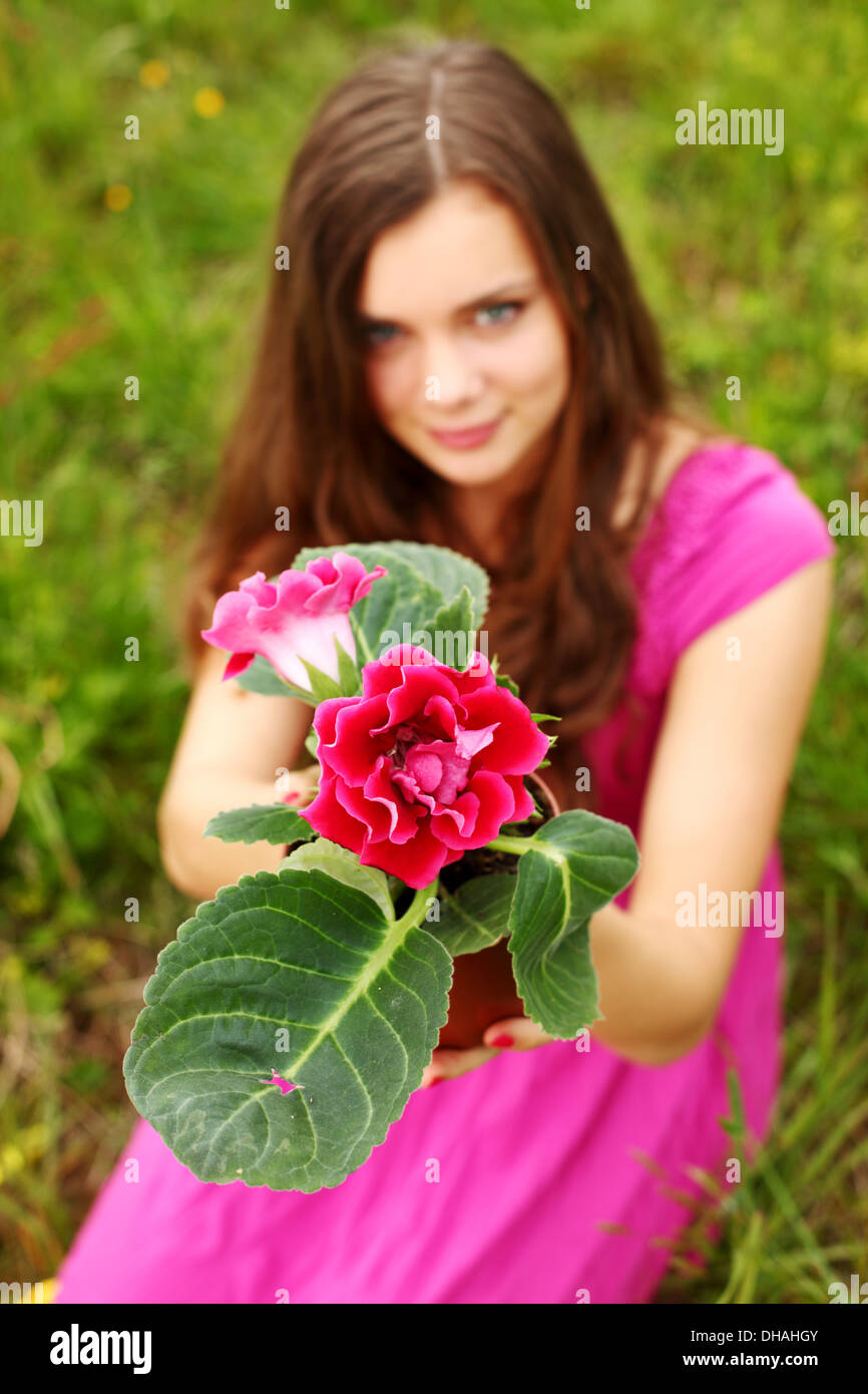 flower in woman hands close up Stock Photo - Alamy