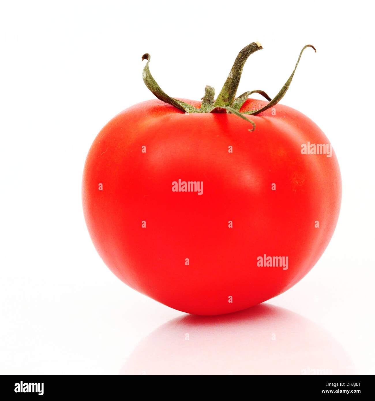 one tomato isolated on white Stock Photo - Alamy