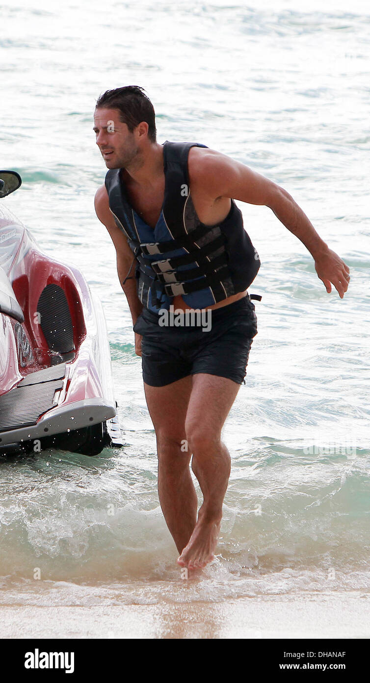 Jamie Redknapp enjoys time on beach in Barbados while on holiday with ...