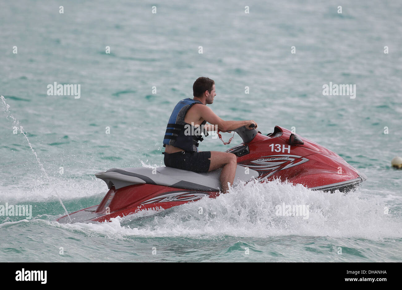 Jamie Redknapp enjoys time on beach in Barbados while on holiday with ...