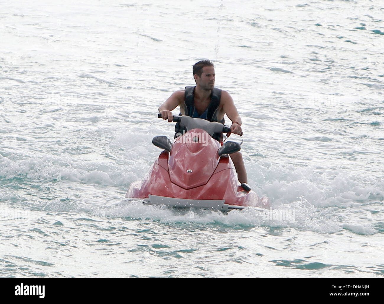 Jamie Redknapp enjoys time on beach in Barbados while on holiday with ...