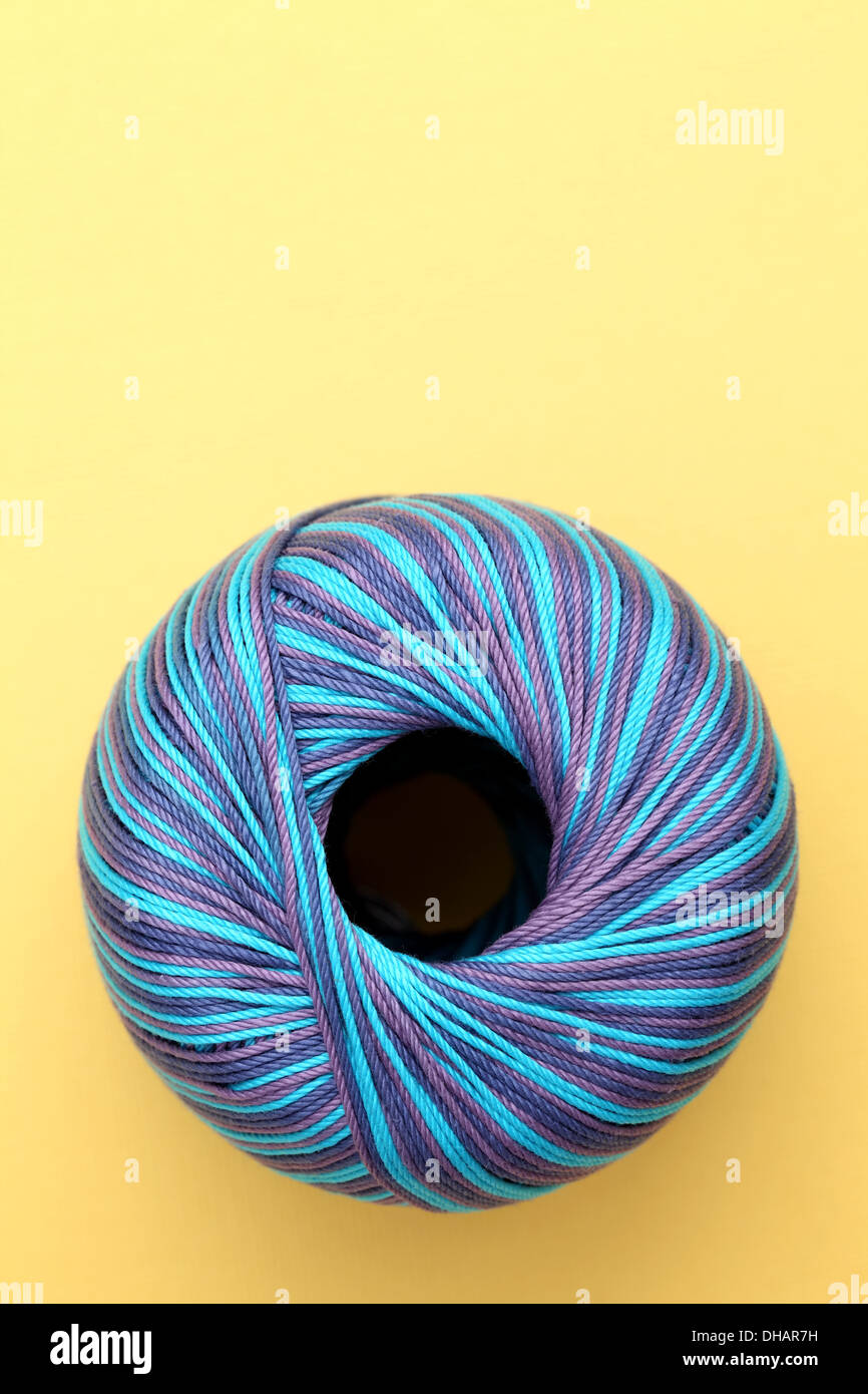 roll of sewing thread no yellow background Stock Photo - Alamy