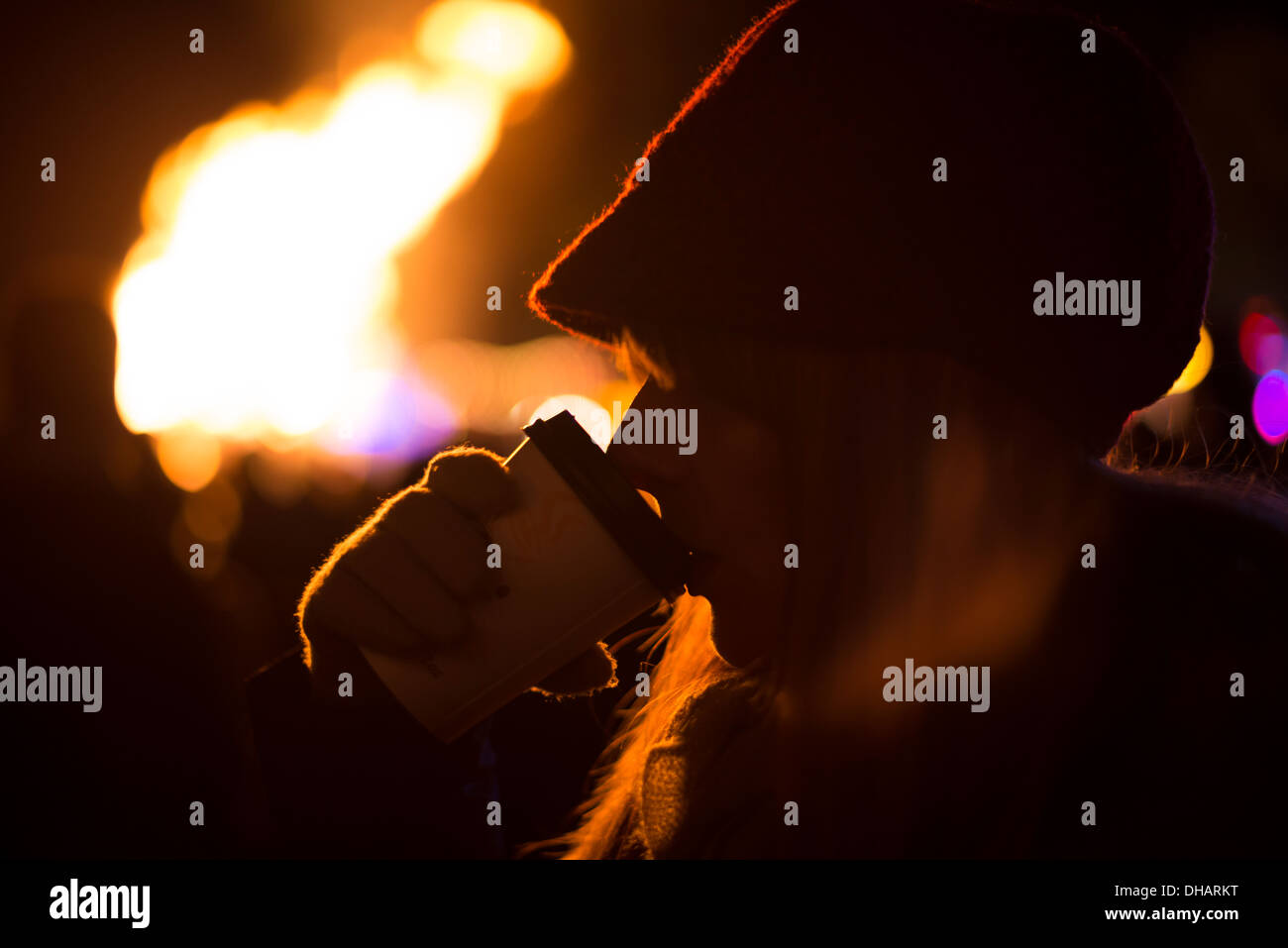 Woman drinking coffee bonfire hi-res stock photography and images - Alamy