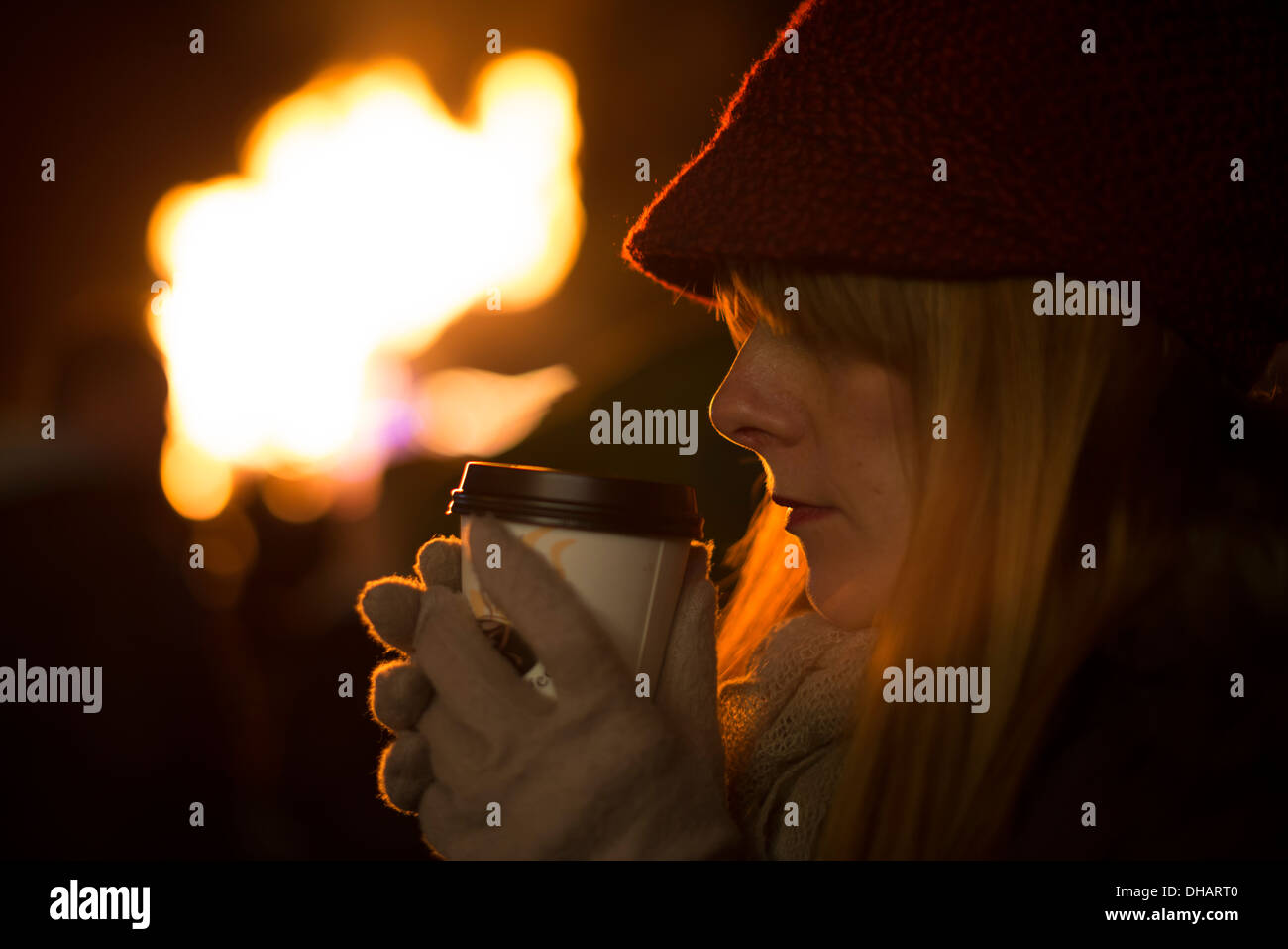 Woman drinking coffee bonfire hi-res stock photography and images - Alamy