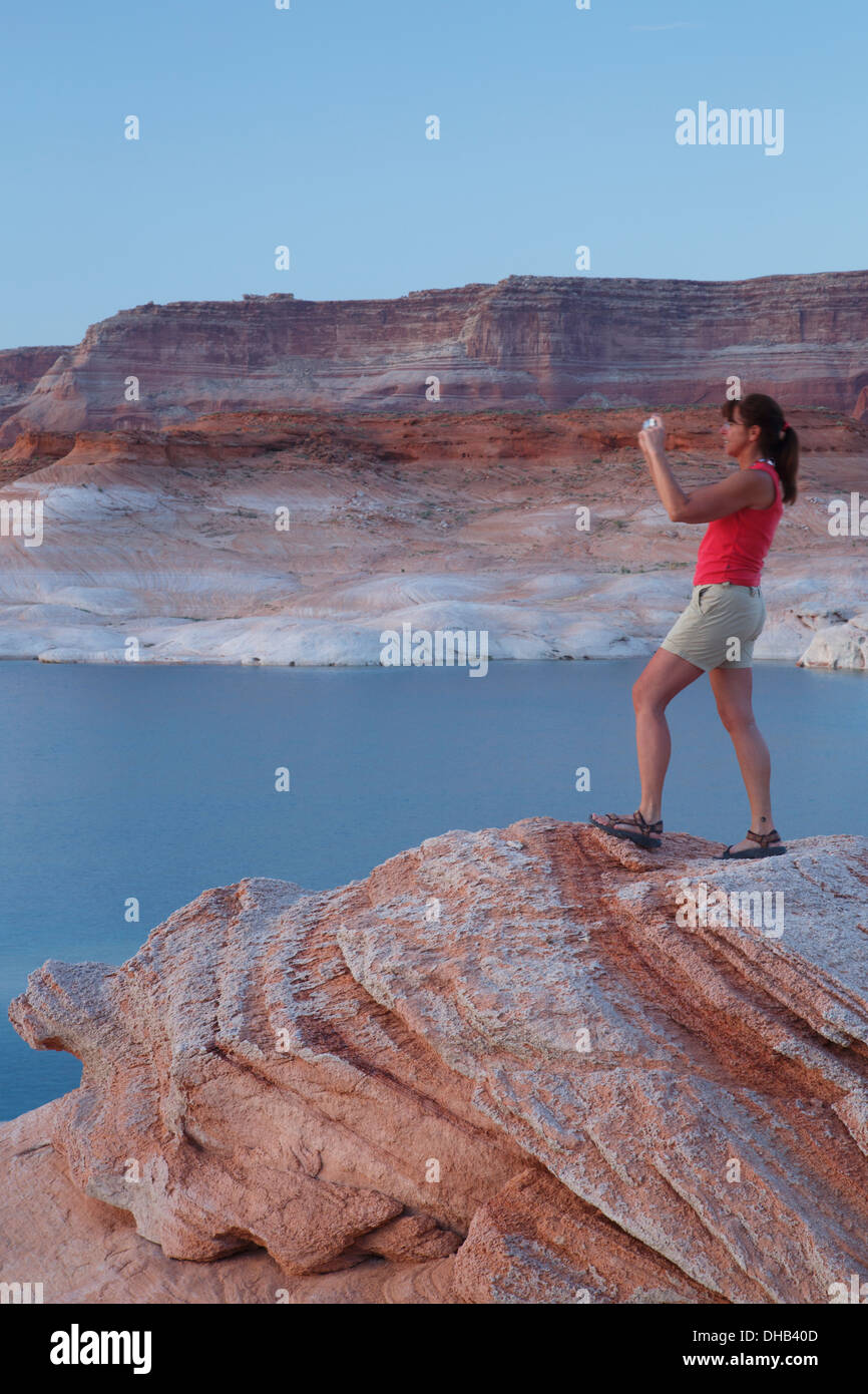 A visitor at West Canyon, Lake Powell, Glen Canyon National Recreation ...