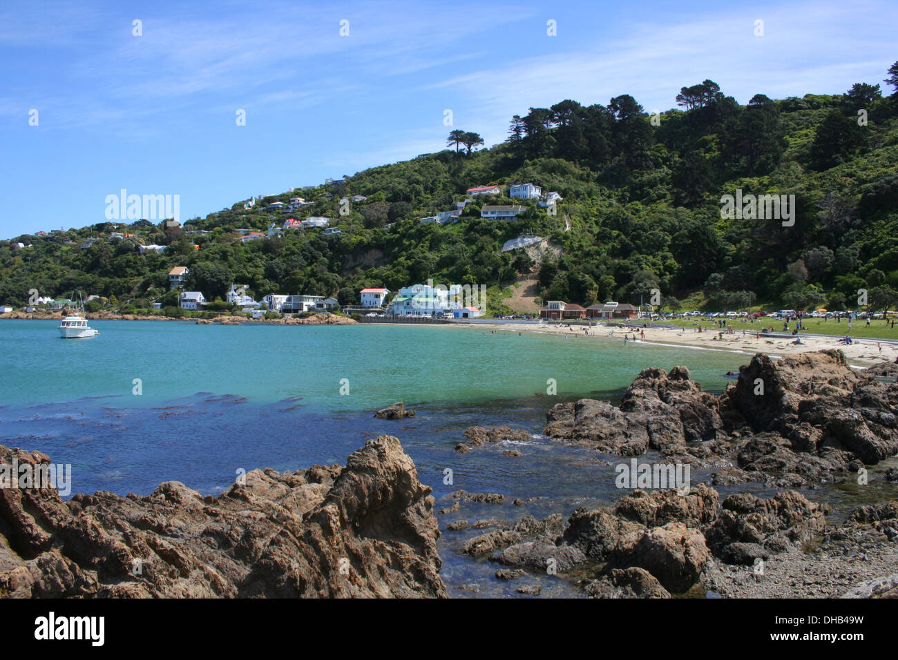 People enjoying the beach on a sunny spring day Stock Photo - Alamy