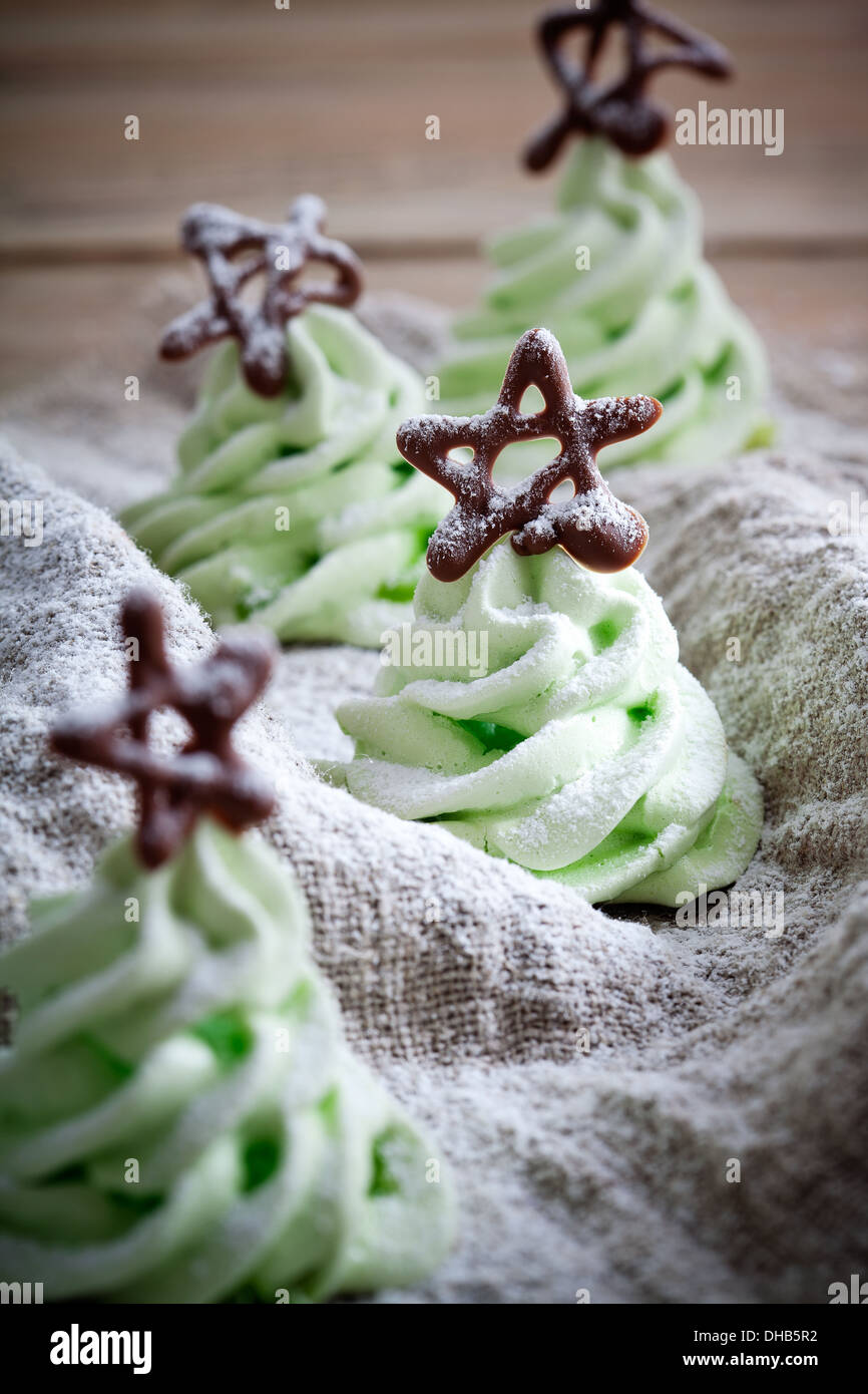 Close up of green christmas tree meringues Stock Photo - Alamy