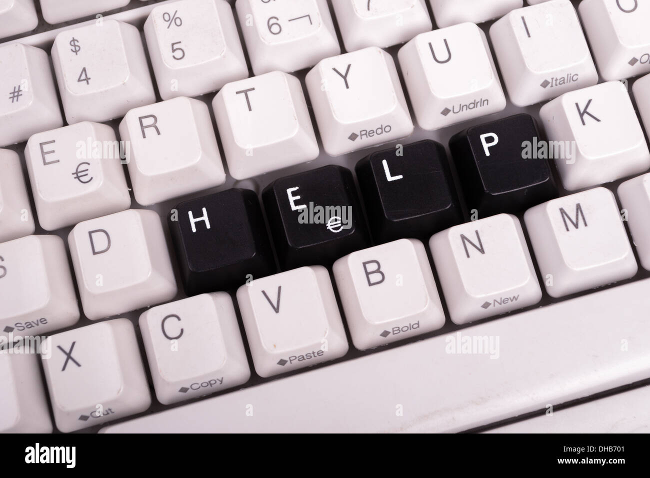 Word Help written with black keys on computer keyboard Stock Photo - Alamy