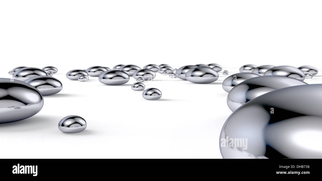 A collection of various size droplets of liquid mercury on an isolated ...