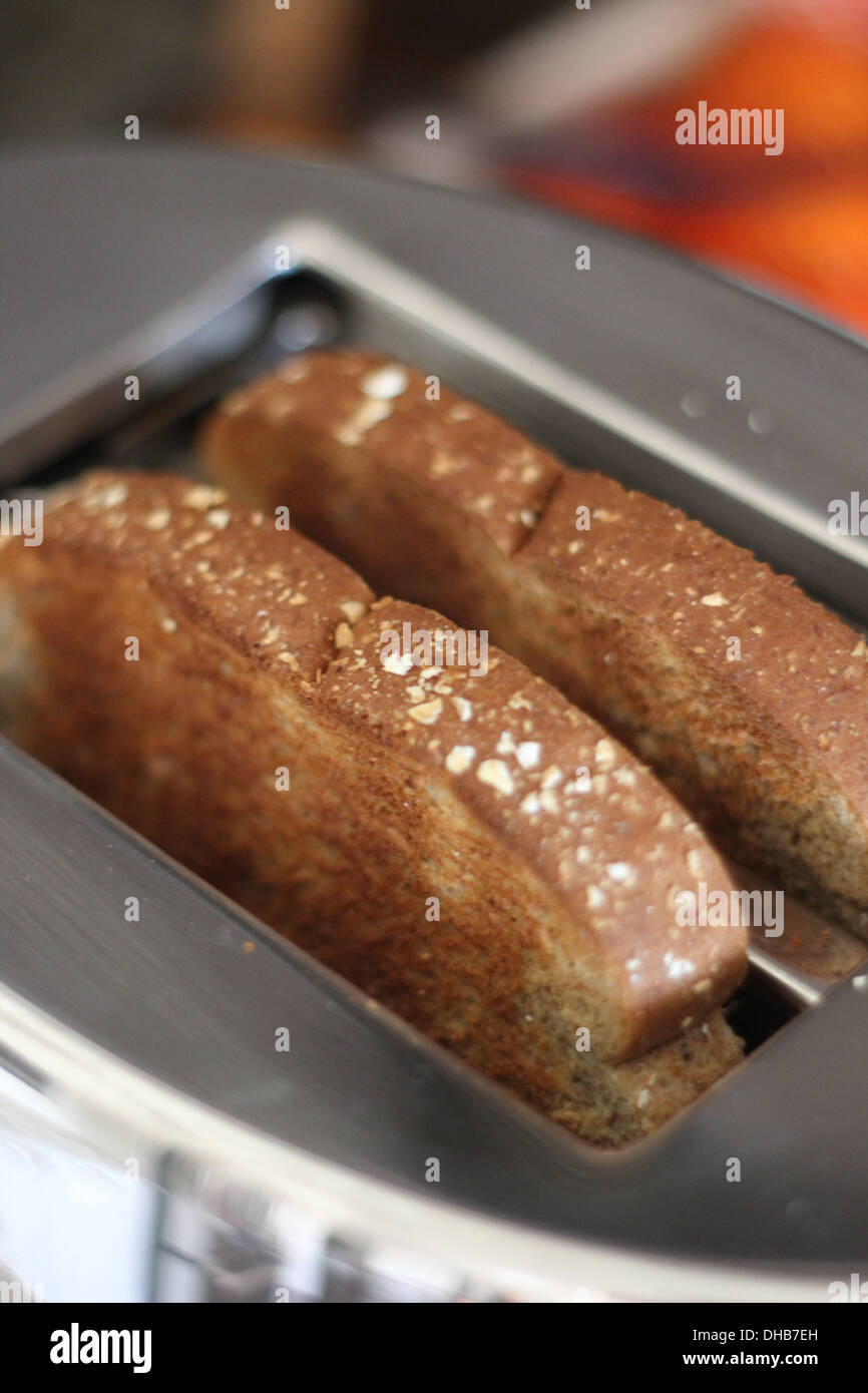 Grain bread in toaster hi-res stock photography and images - Alamy