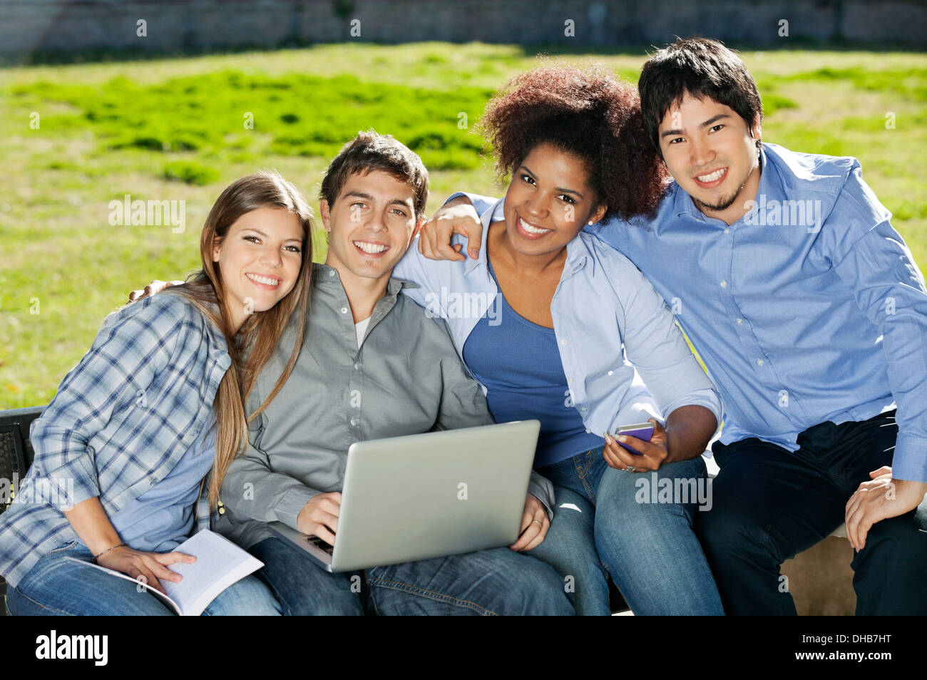 Group young students around laptop hi-res stock photography and images ...