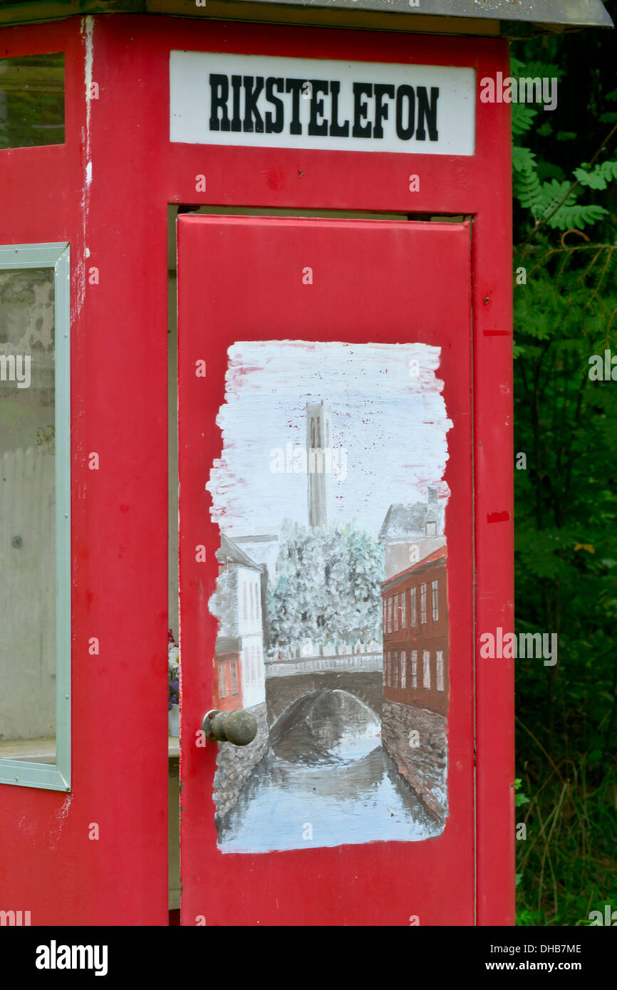 Swedish old-fashioned phone booth with painting on the door Stock Photo ...