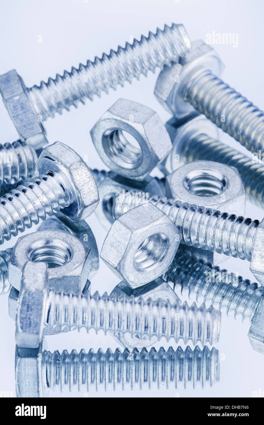 Silver Screws And Bolts On A White Background Stock Photo - Alamy