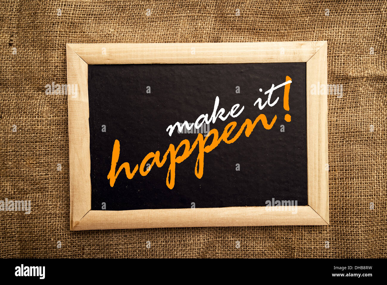 make it happen, motivational message on blackboard Stock Photo - Alamy