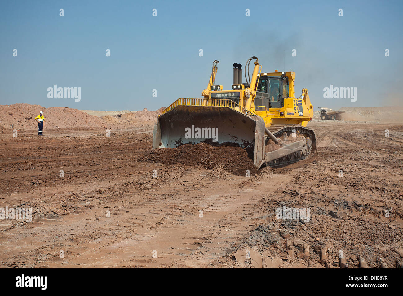 A large Komatsu D475A Crawler Tractor dozer bulldozer in action, Zambia ...