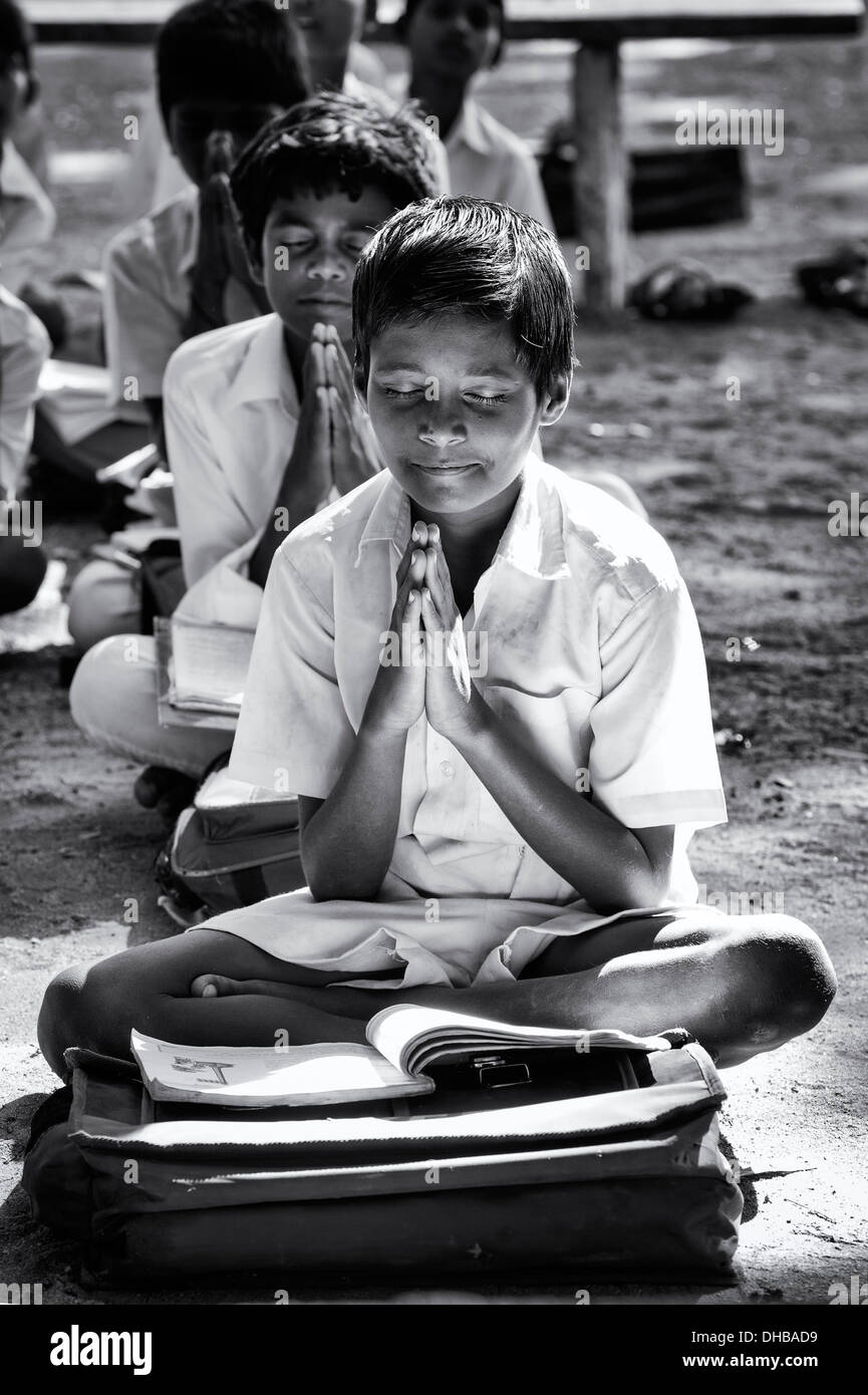 Rural Indian village high school boys doing morning prayers in an ...