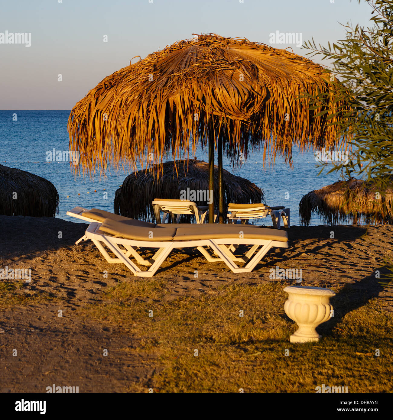 Early morning on a sea beach shined by rising sun Stock Photo - Alamy