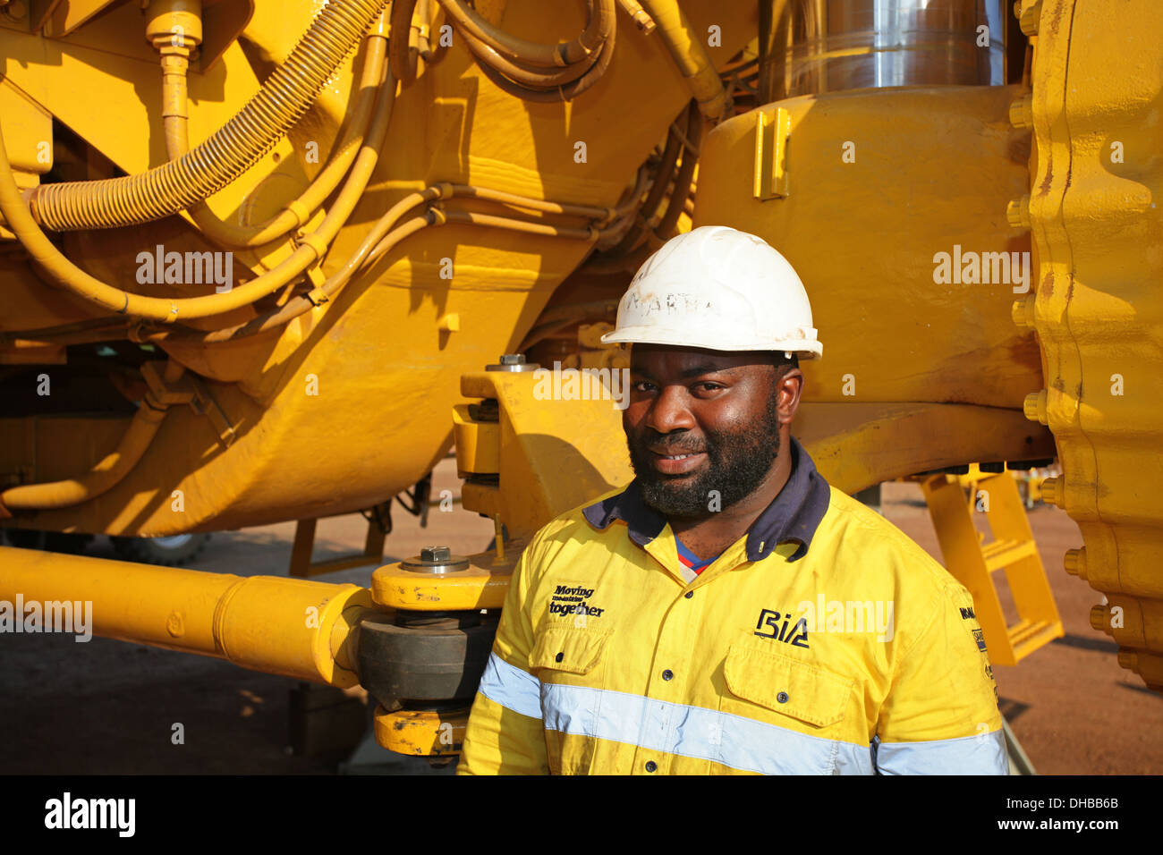 Portrait of Zambian mining employee. Hard working man with hard hat ...