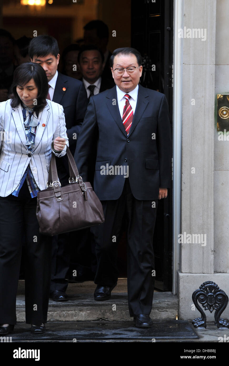 Chinese official Li Changchun (R) leaves 10 Downing street after a ...