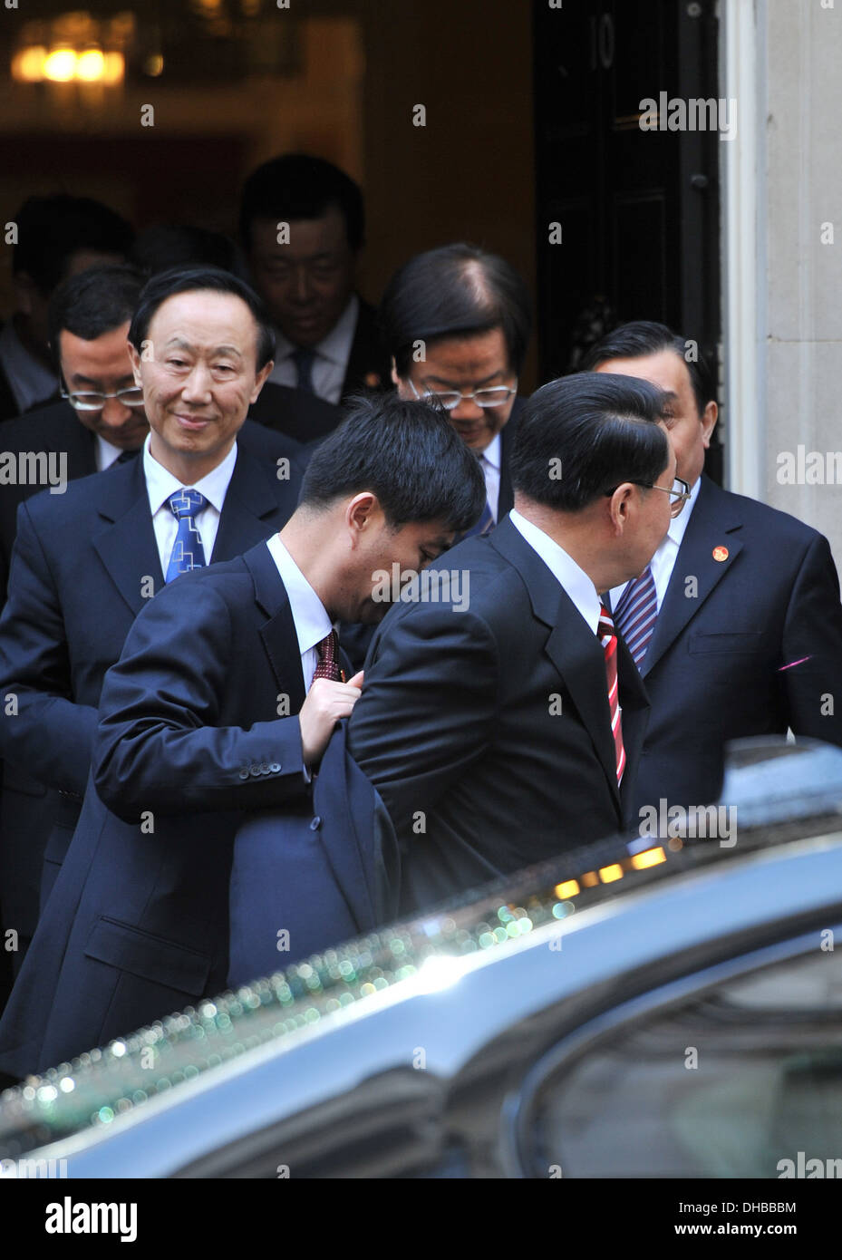 Chinese official Li Changchun (R) leaves 10 Downing street after a ...
