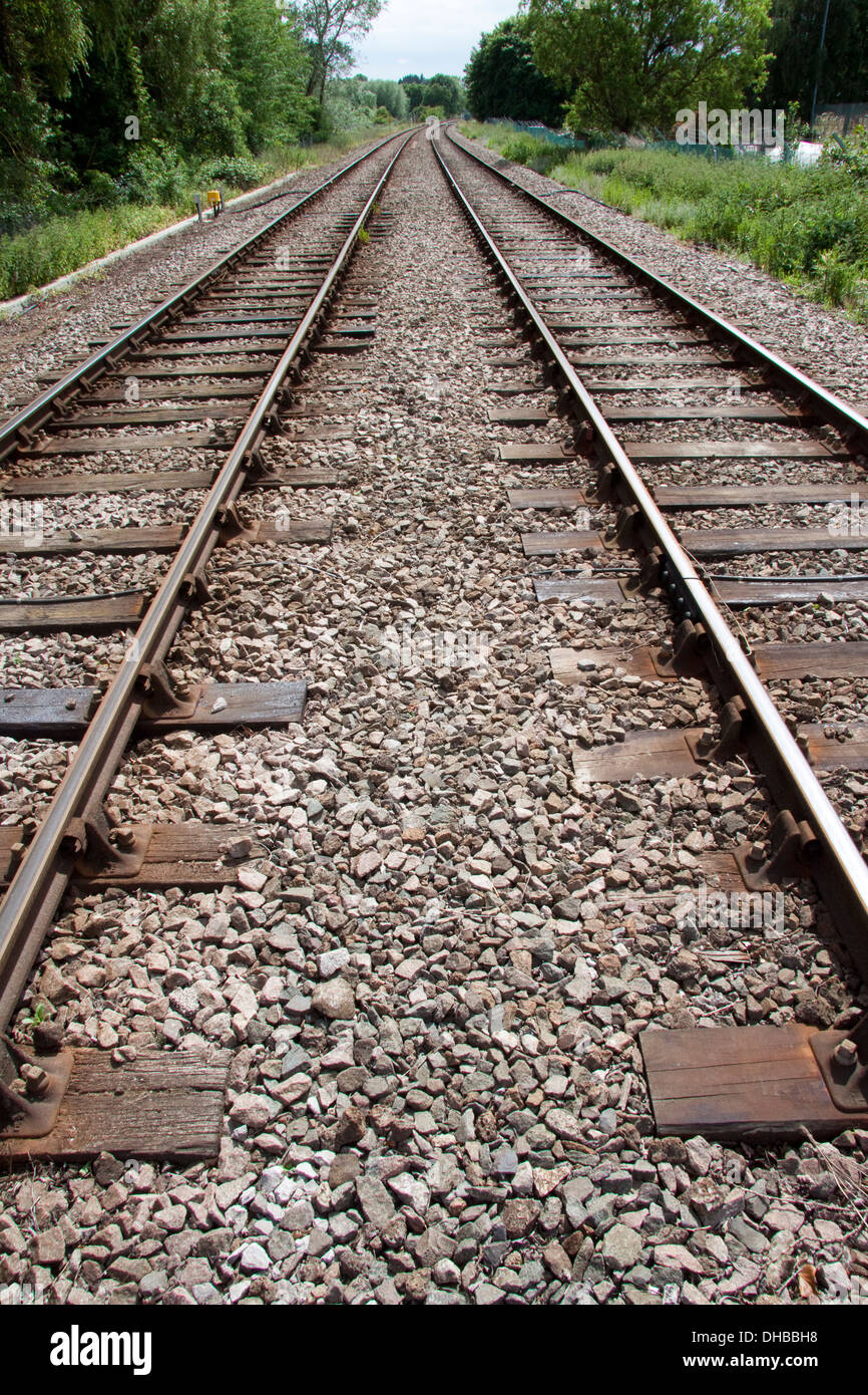 Two pairs of rail tracks demonstrate perspective Stock Photo - Alamy