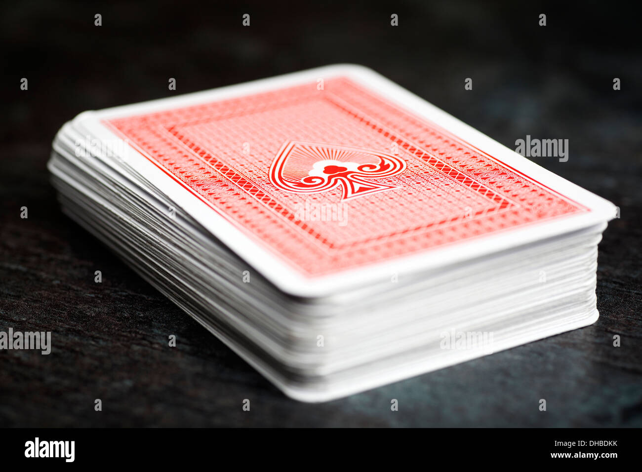 Deck of playing cards with red design Stock Photo - Alamy