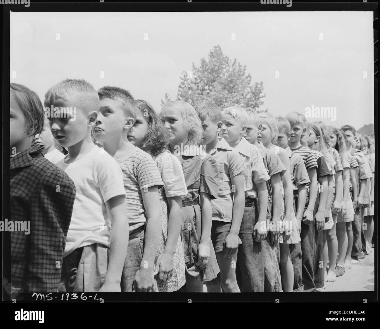 Four in line Black and White Stock Photos & Images - Alamy