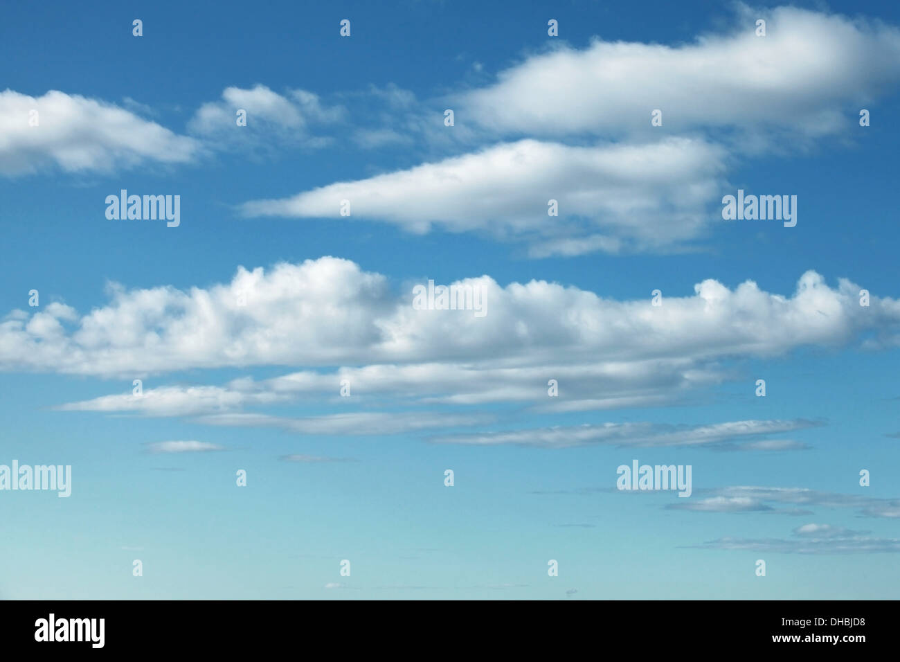 Natural bright blue cloudy sky background photo texture Stock Photo - Alamy