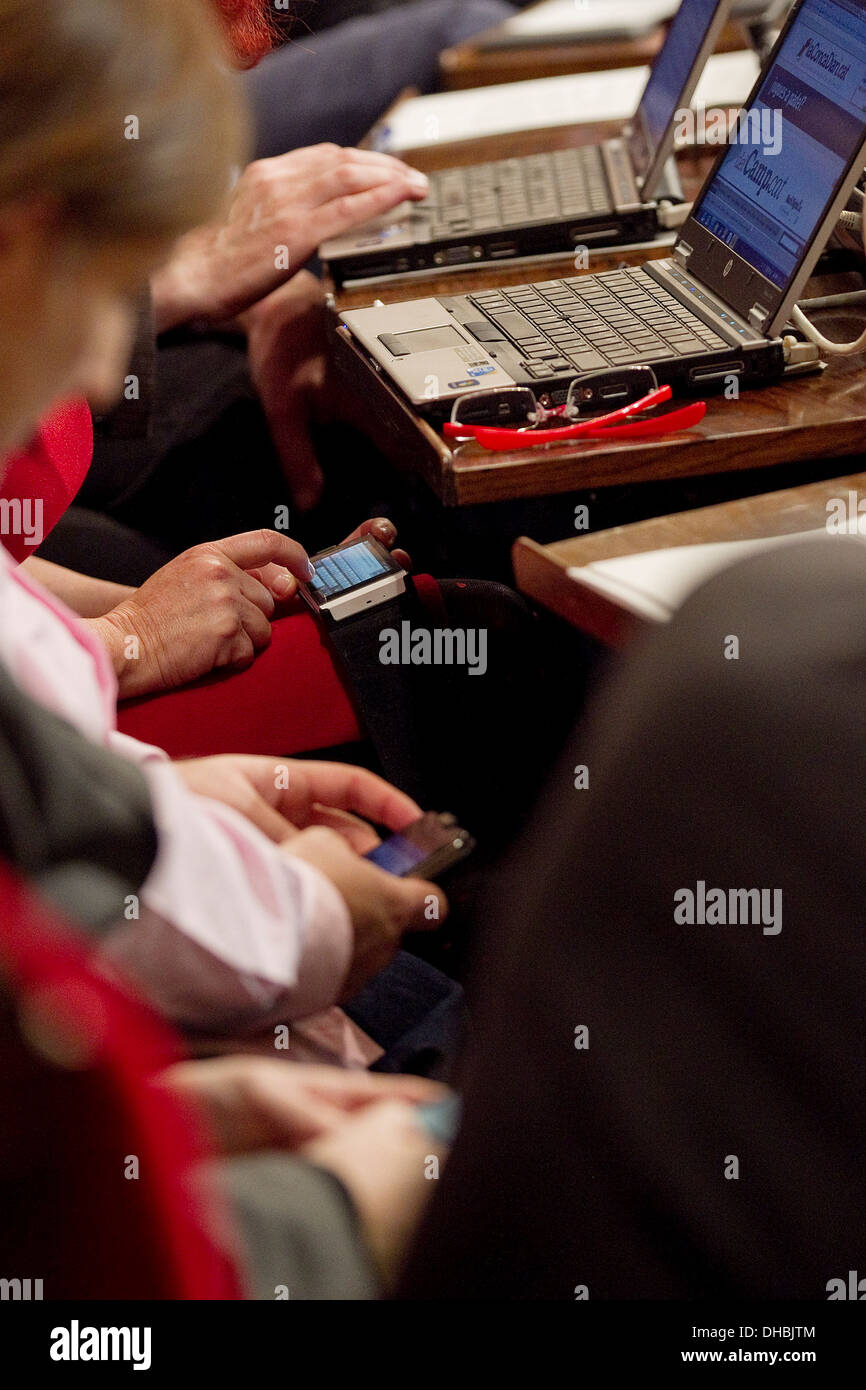 People using their mobile phones and laptops, Majorca, Spain Stock ...