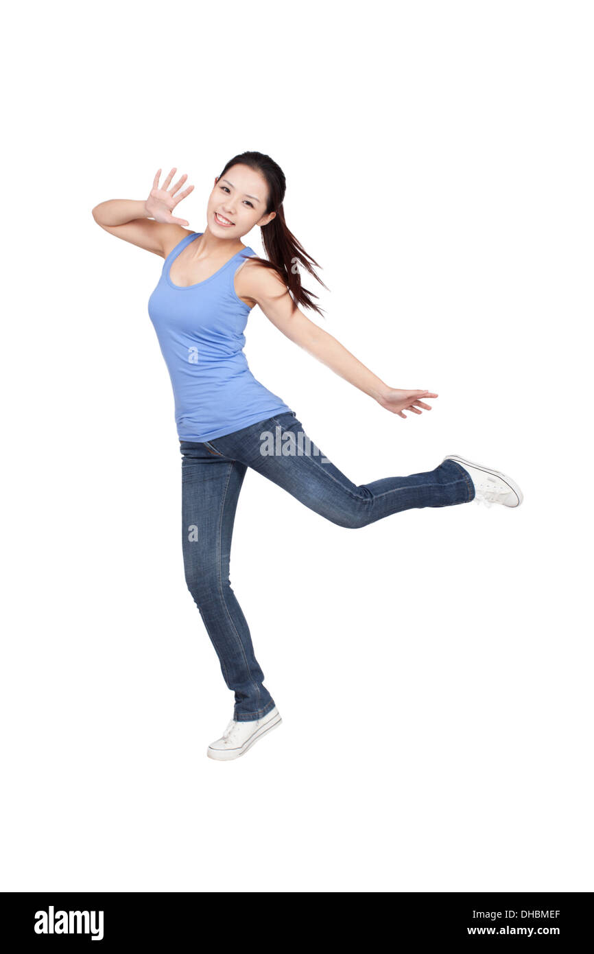 Young woman dancing,smiling Stock Photo - Alamy